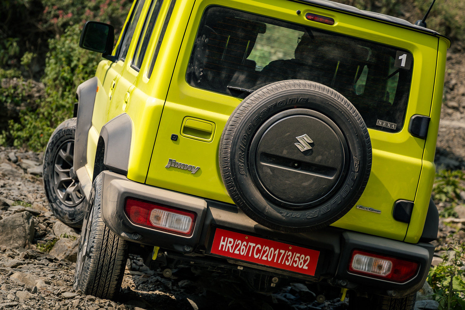Maruti Jimny vs Mahindra Thar: In Pics Comparison | CarDekho.com