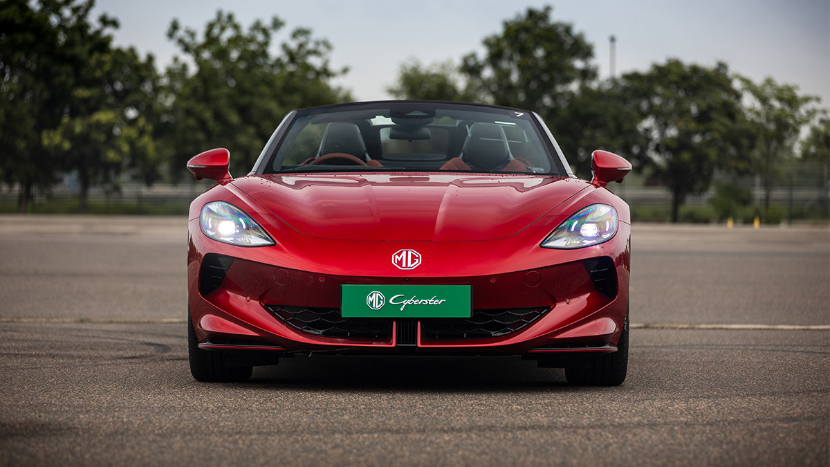 2025 MG Cyberster EV vs BMW Z4: Exterior And Interior Compared In Images | CarDekho.com